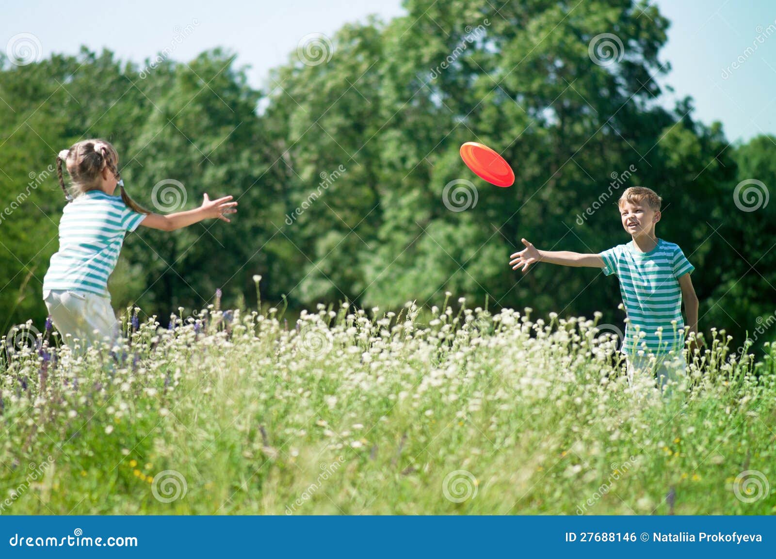 Children playing frisbee stock photo. Image of disc, male - 27688146