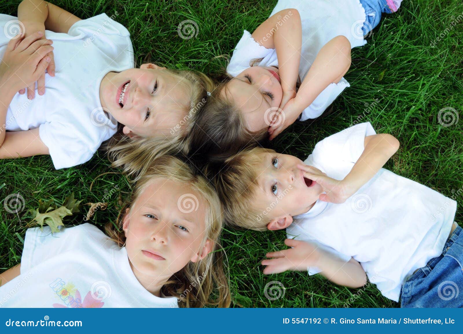 Children Playing on the Grass Stock Photo - Image of group, female: 5547192