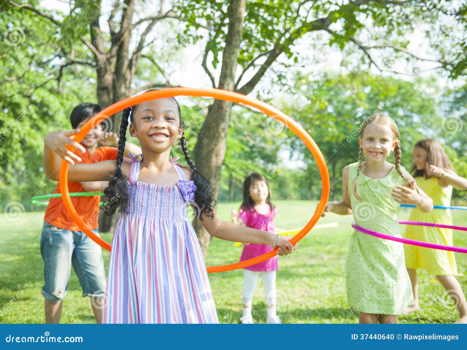 Children Playing with Hoola Hoops Stock Photo - Image of friendship ...