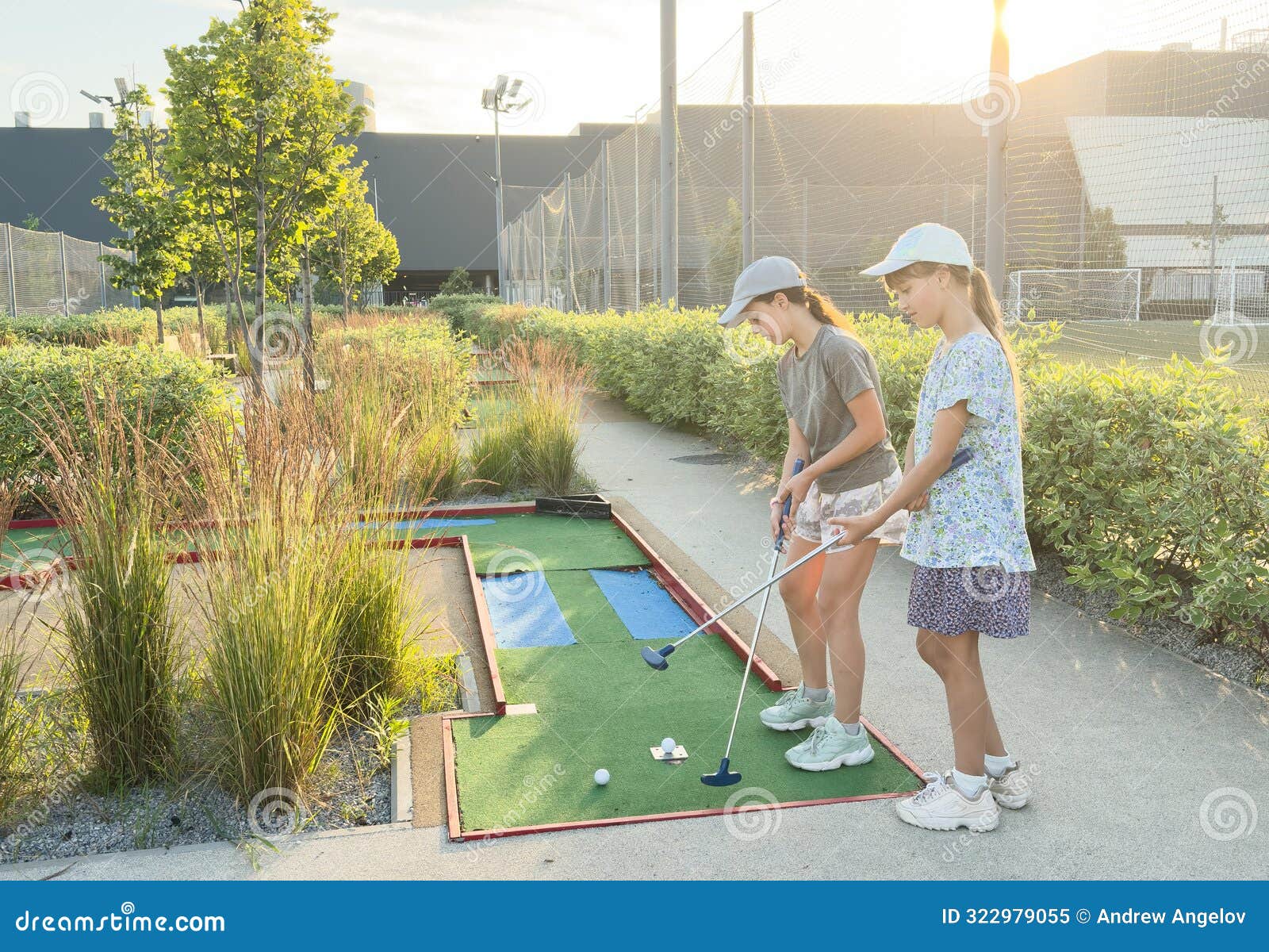 Children Playing Mini Golf. Child Golfer Stock Image - Image of ...