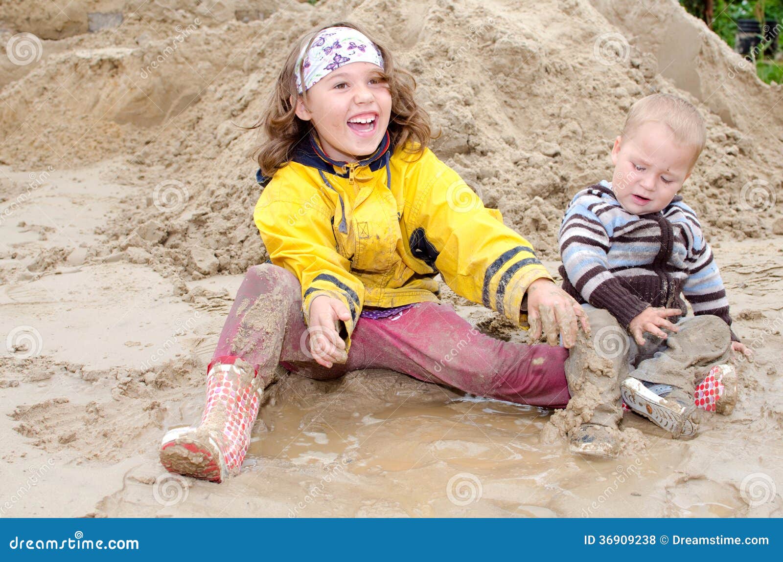 Children Playing in the Mud Stock Photo - Image of rain, laugh: 36909238