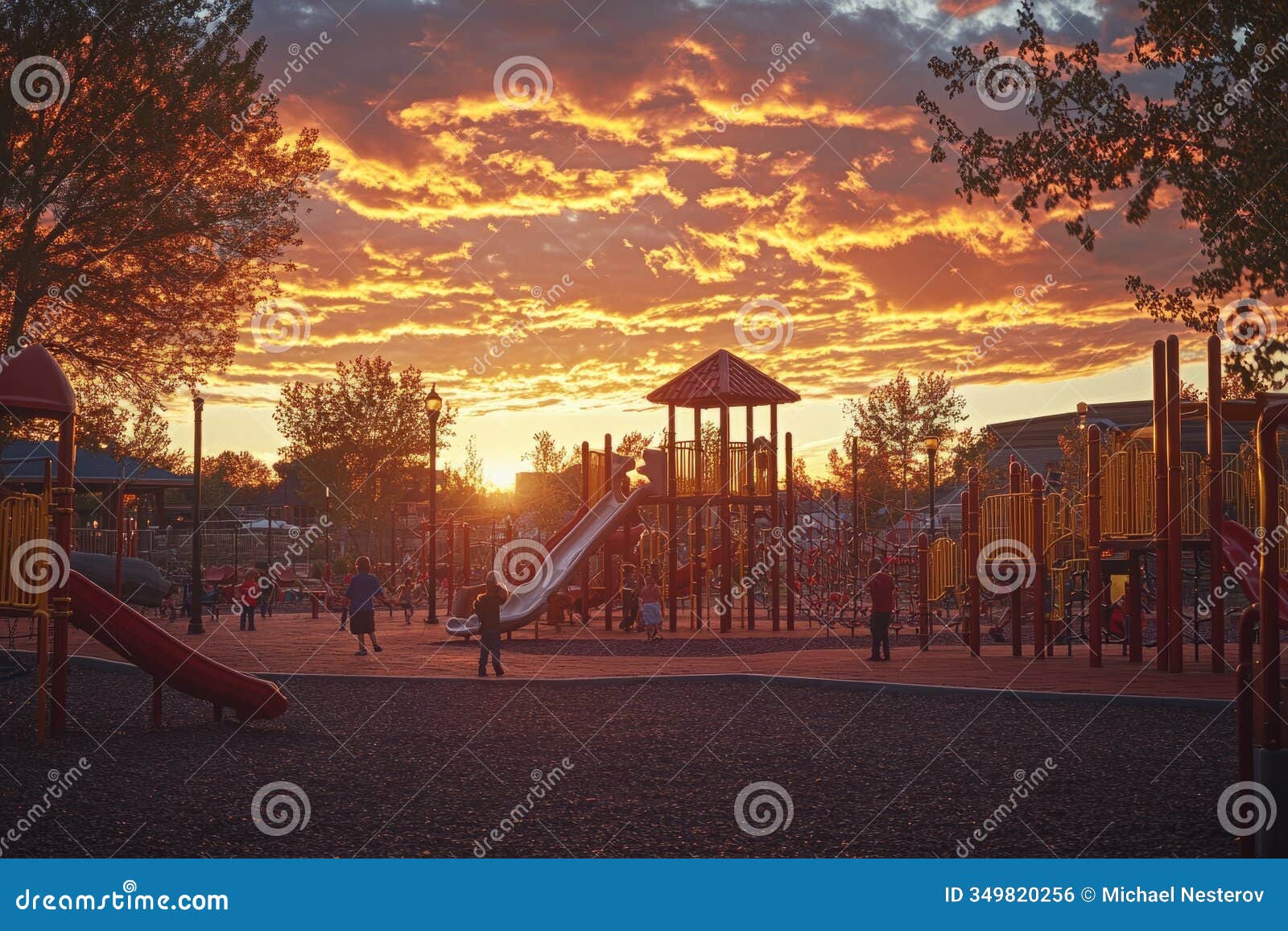 Children Playing on Playground Equipment at Sunset Stock Photo - Image ...