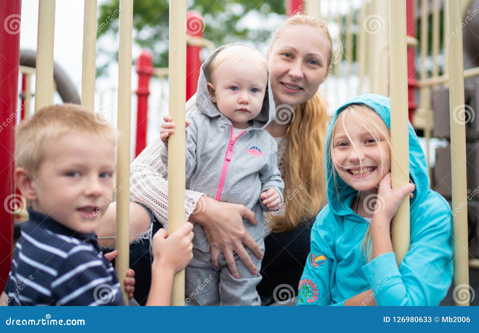 Children Playing at Playground Stock Image - Image of outdoor, smile ...