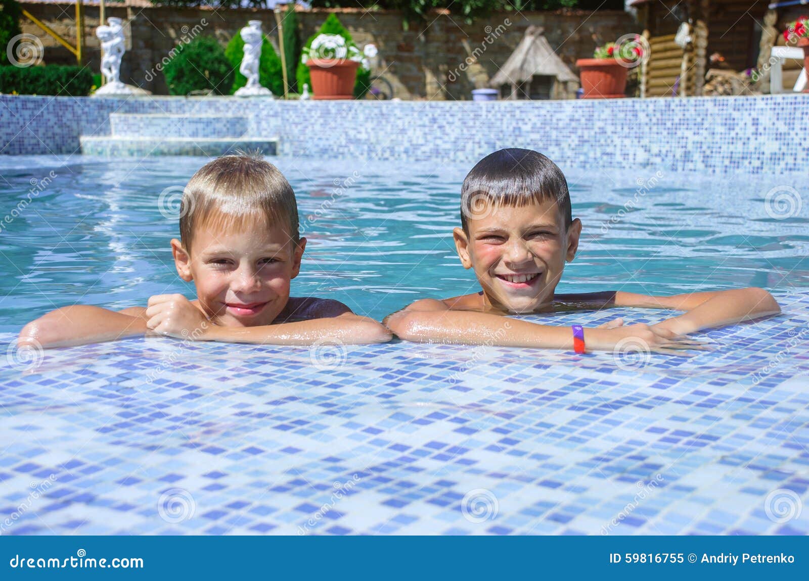 Children playing in pool stock image. Image of family - 59816755