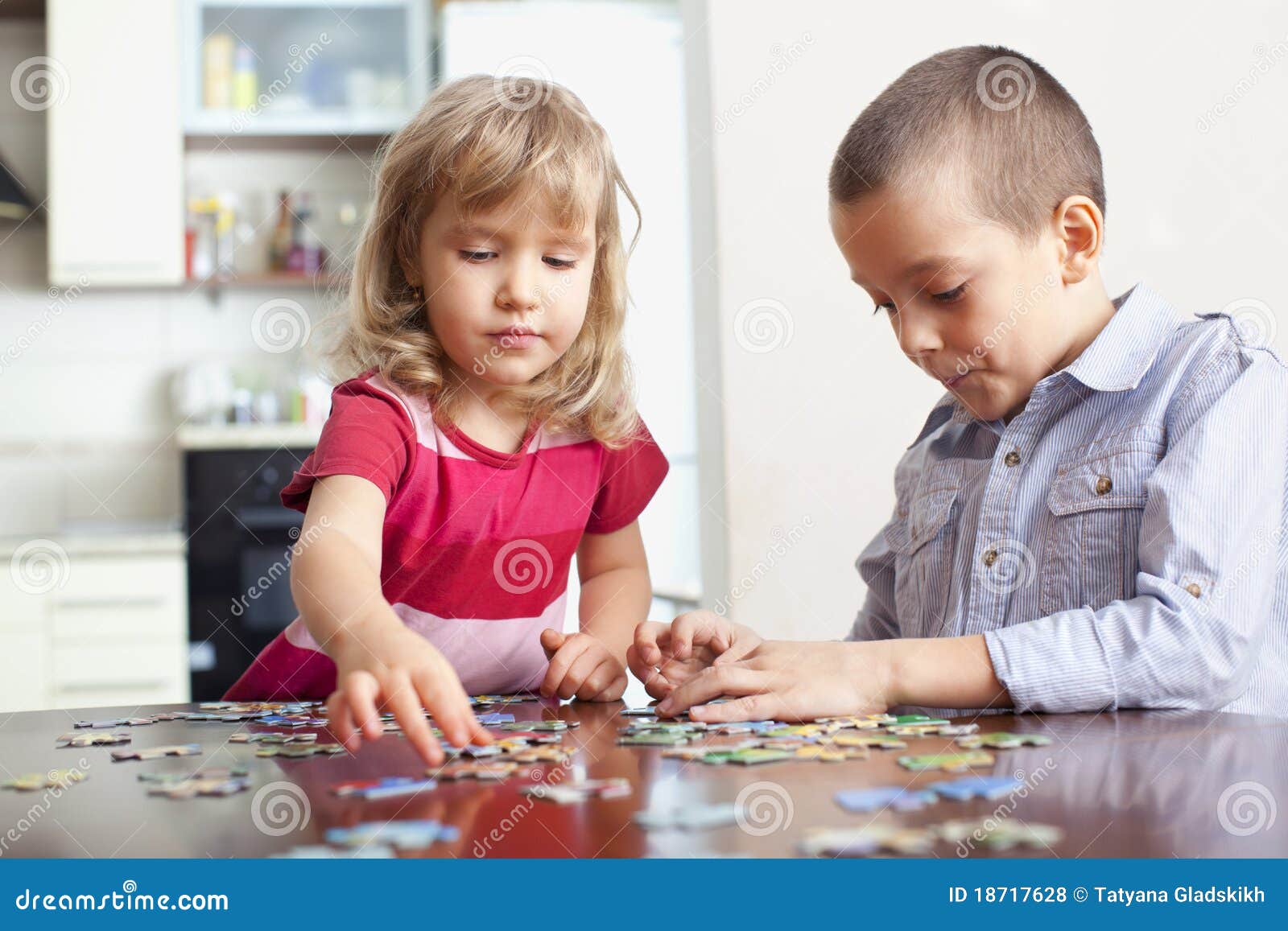 Children, playing puzzles stock photo. Image of preschool - 18717628