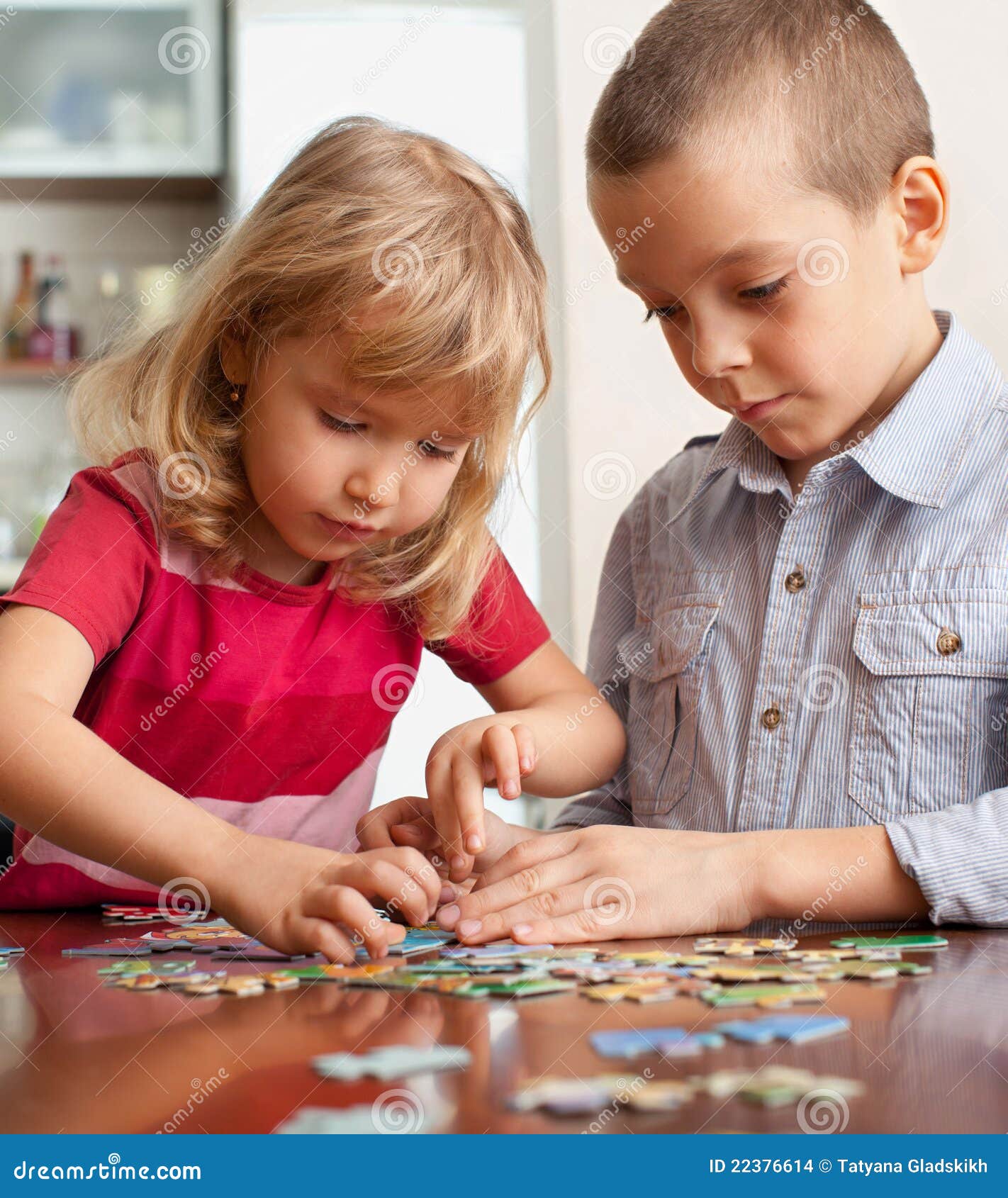 Children, playing puzzles stock photo. Image of puzzle - 22376614