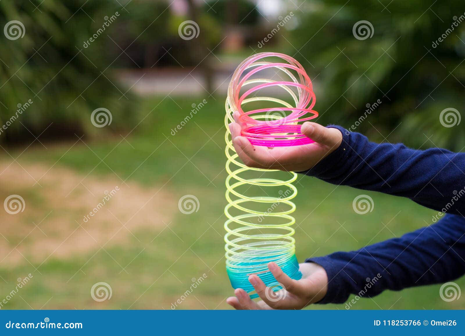 Children Playing with Rainbow Colored Wire Spiral Editorial Photo ...