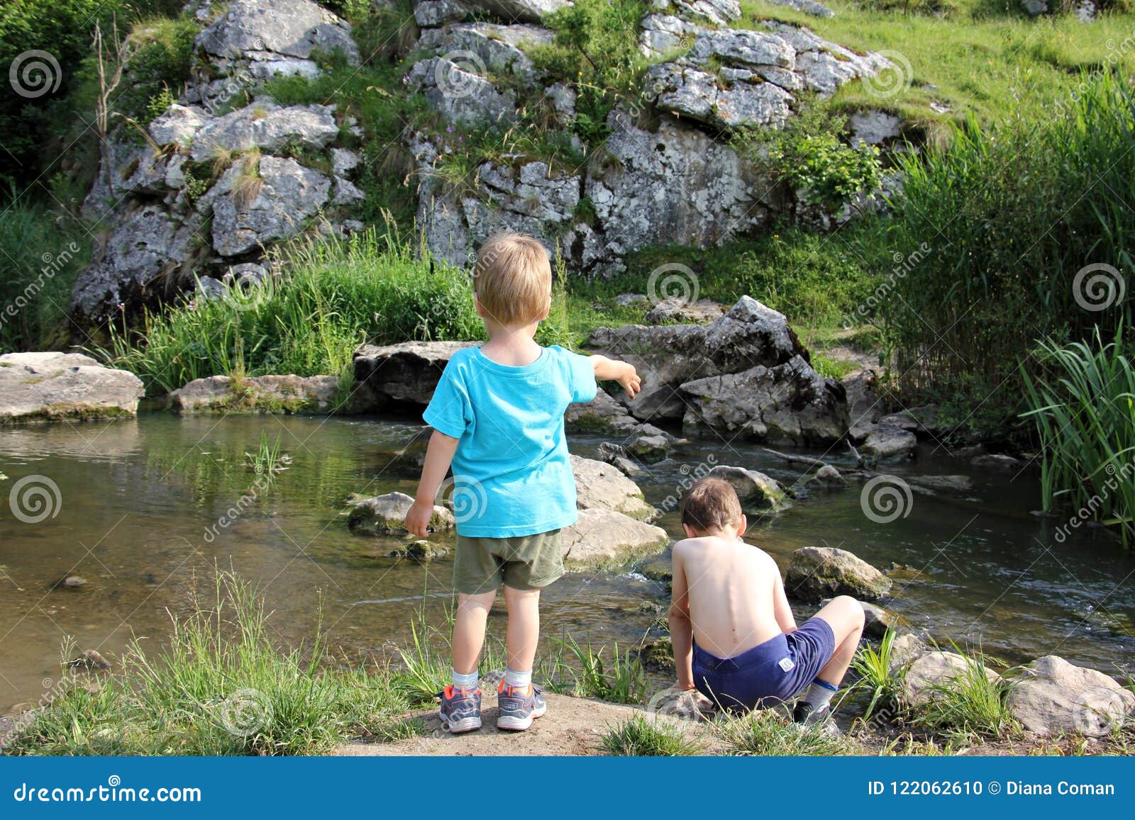 Children Playing in a River Stock Photo - Image of mountains, child ...