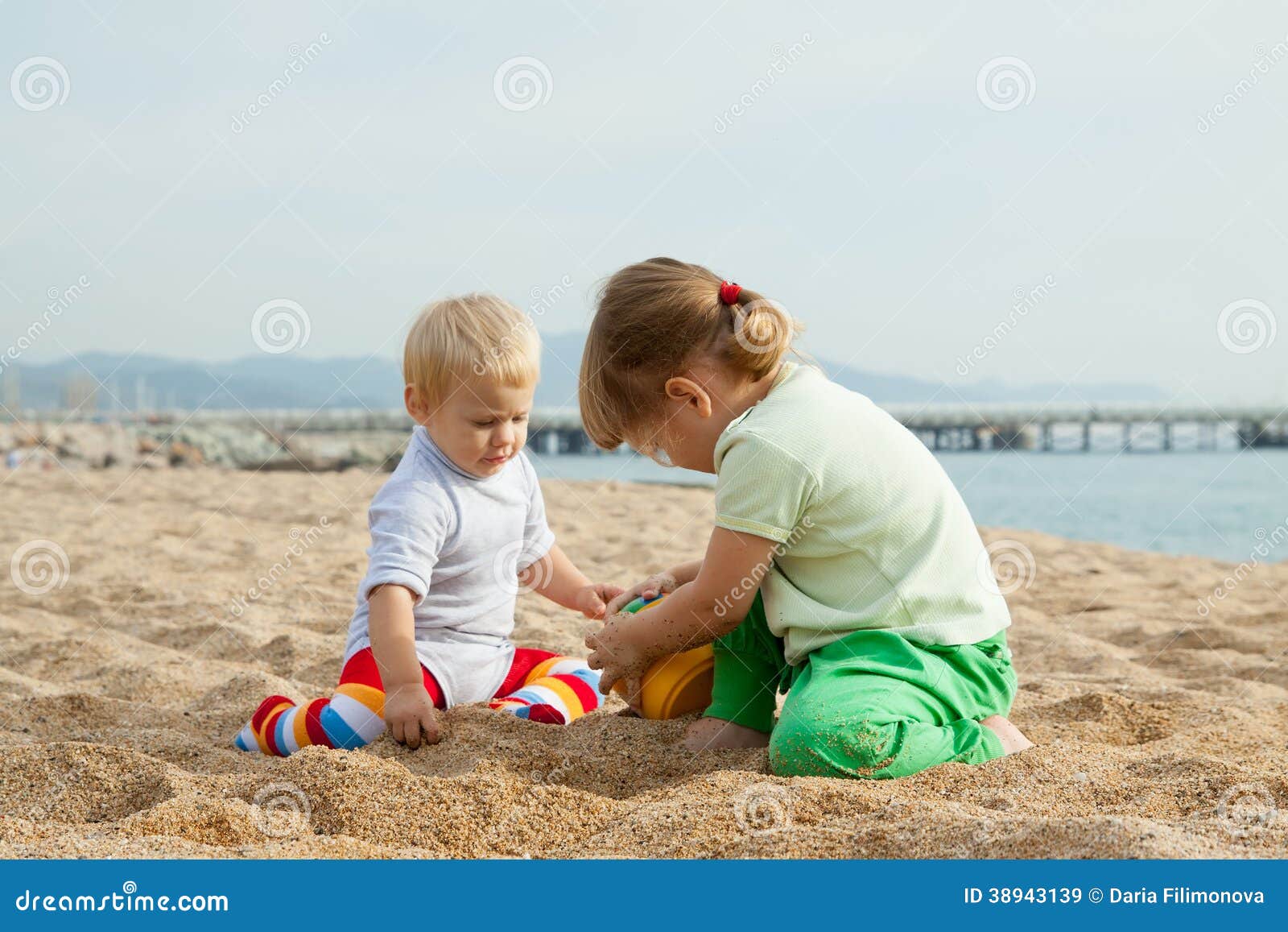 Children playing with sand stock image. Image of babies - 38943139