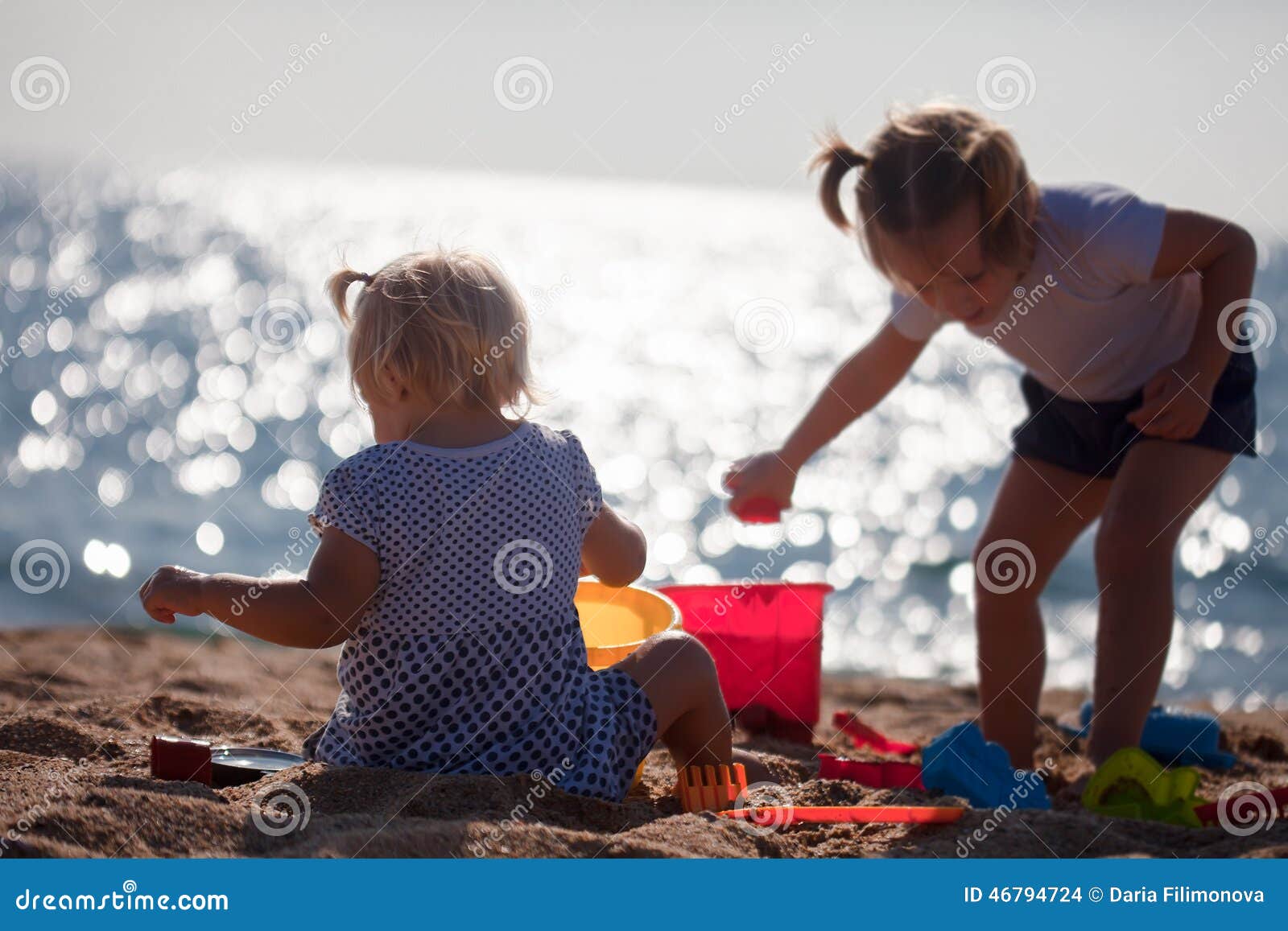 Children playing with sand stock photo. Image of activity - 46794724