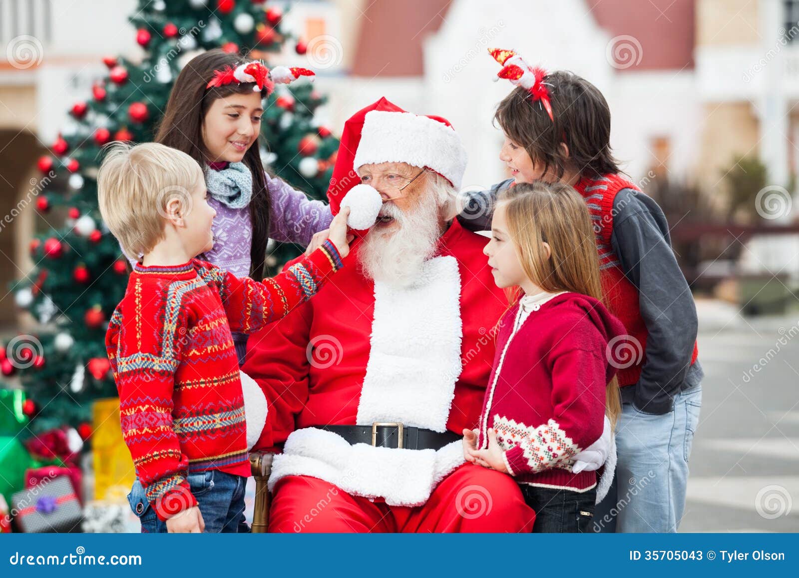 Children Playing with Santa Claus S Hat Stock Image - Image of person ...