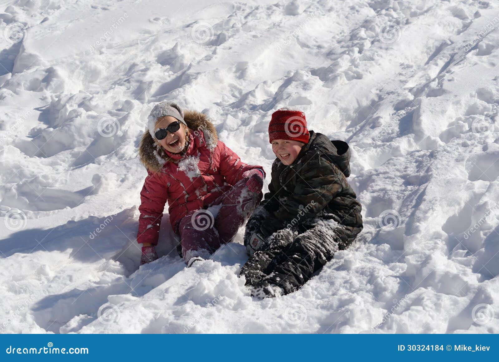 Children playing in snow stock photo. Image of people - 30324184