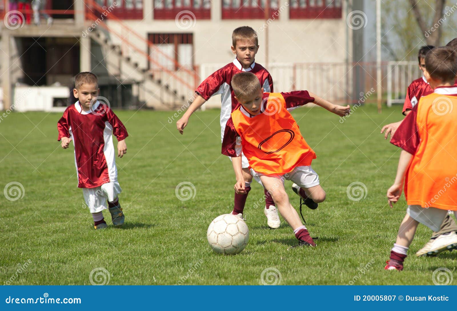 Children playing soccer stock image. Image of little - 20005807