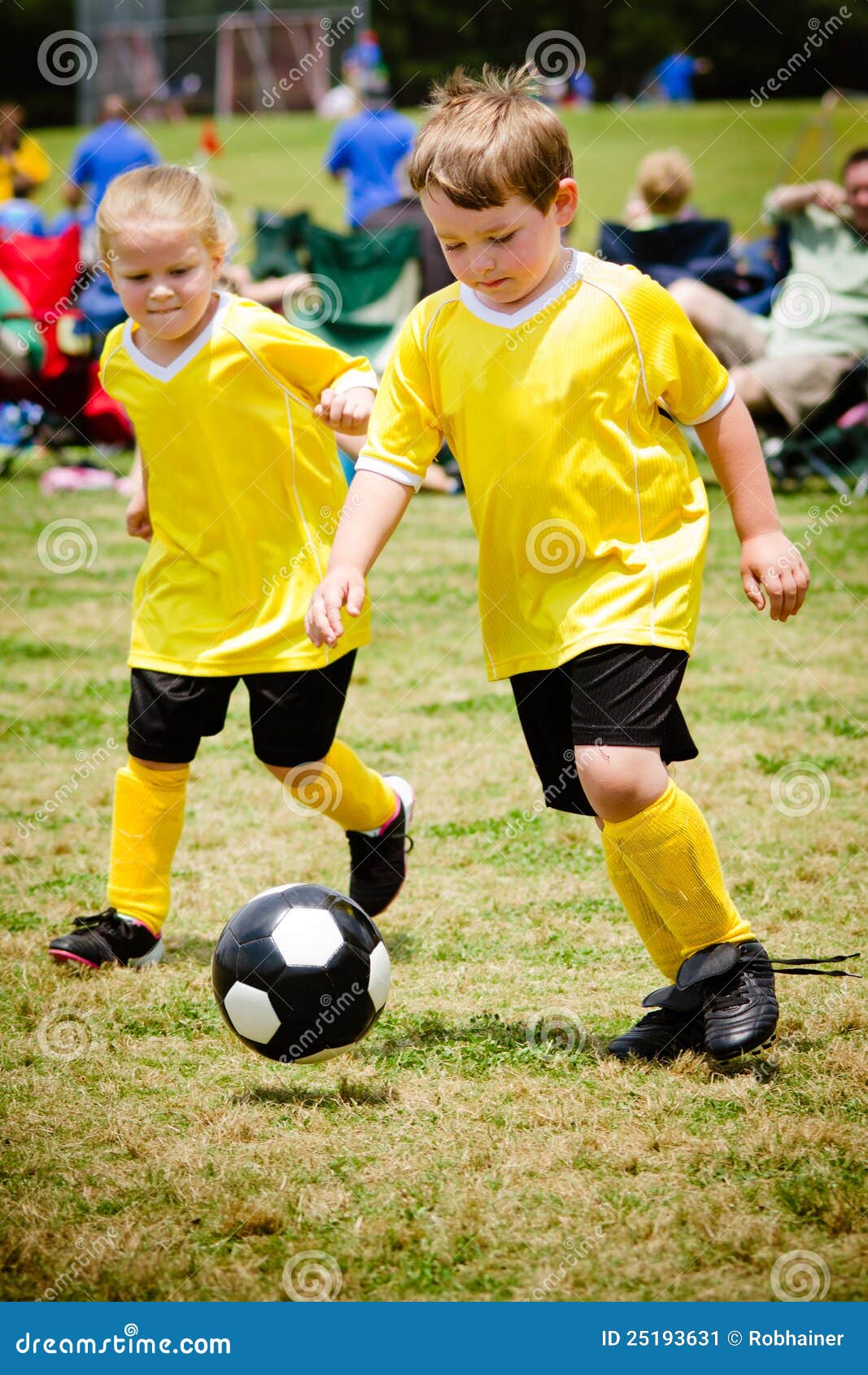 Children playing soccer stock image. Image of frolic - 25193631