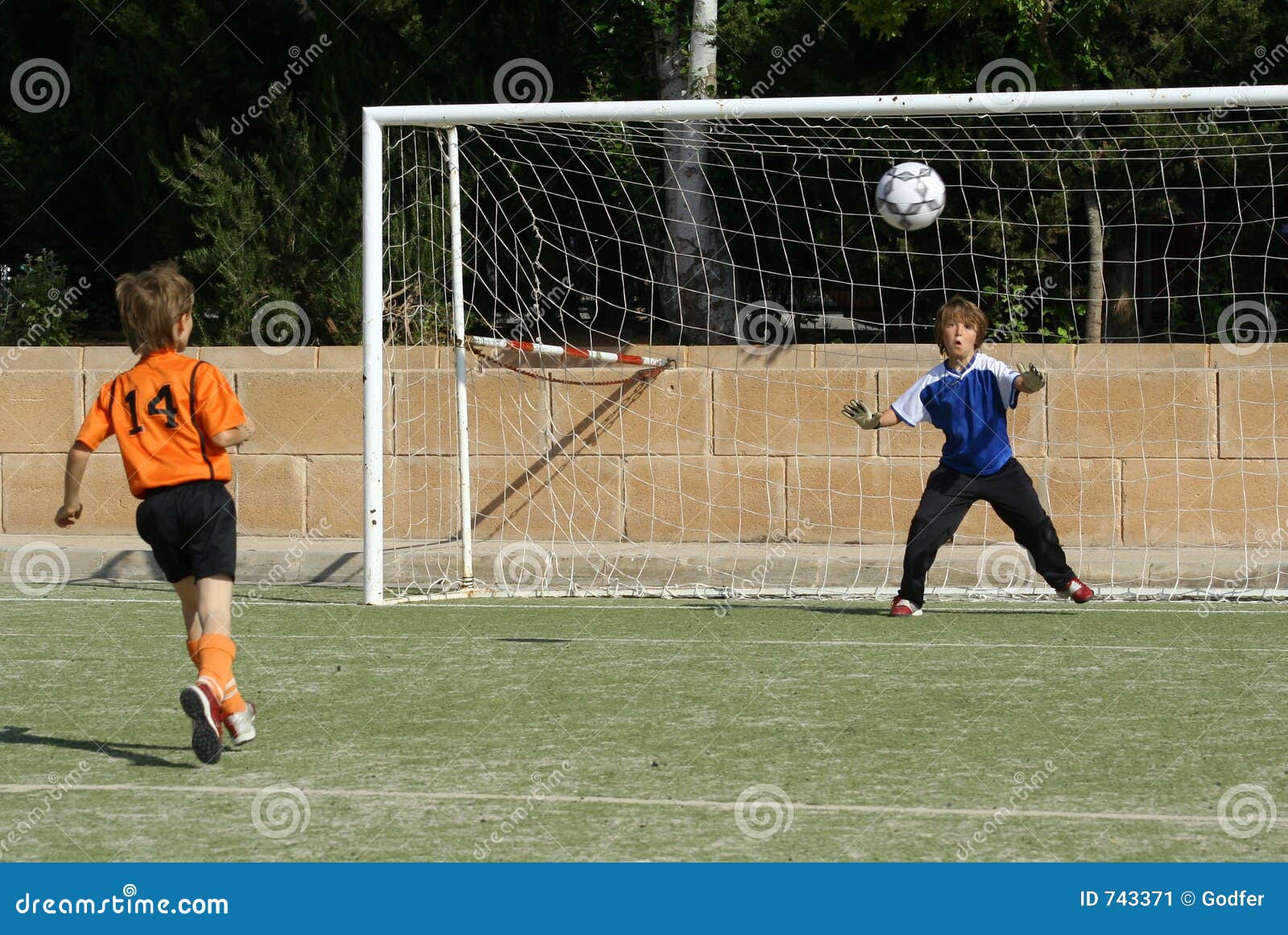 Children playing soccer stock image. Image of save, outside - 743371