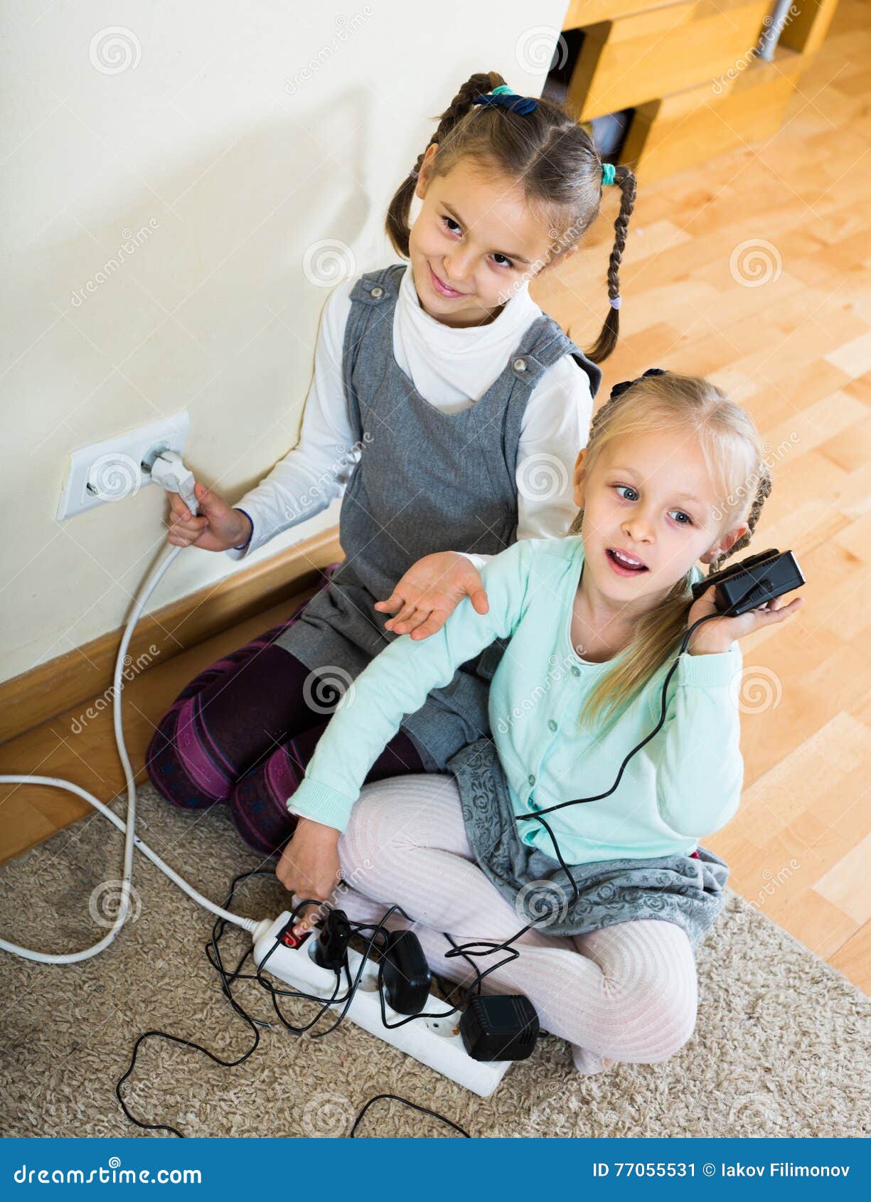 Children Playing with Sockets and Electricity Indoors Stock Image ...