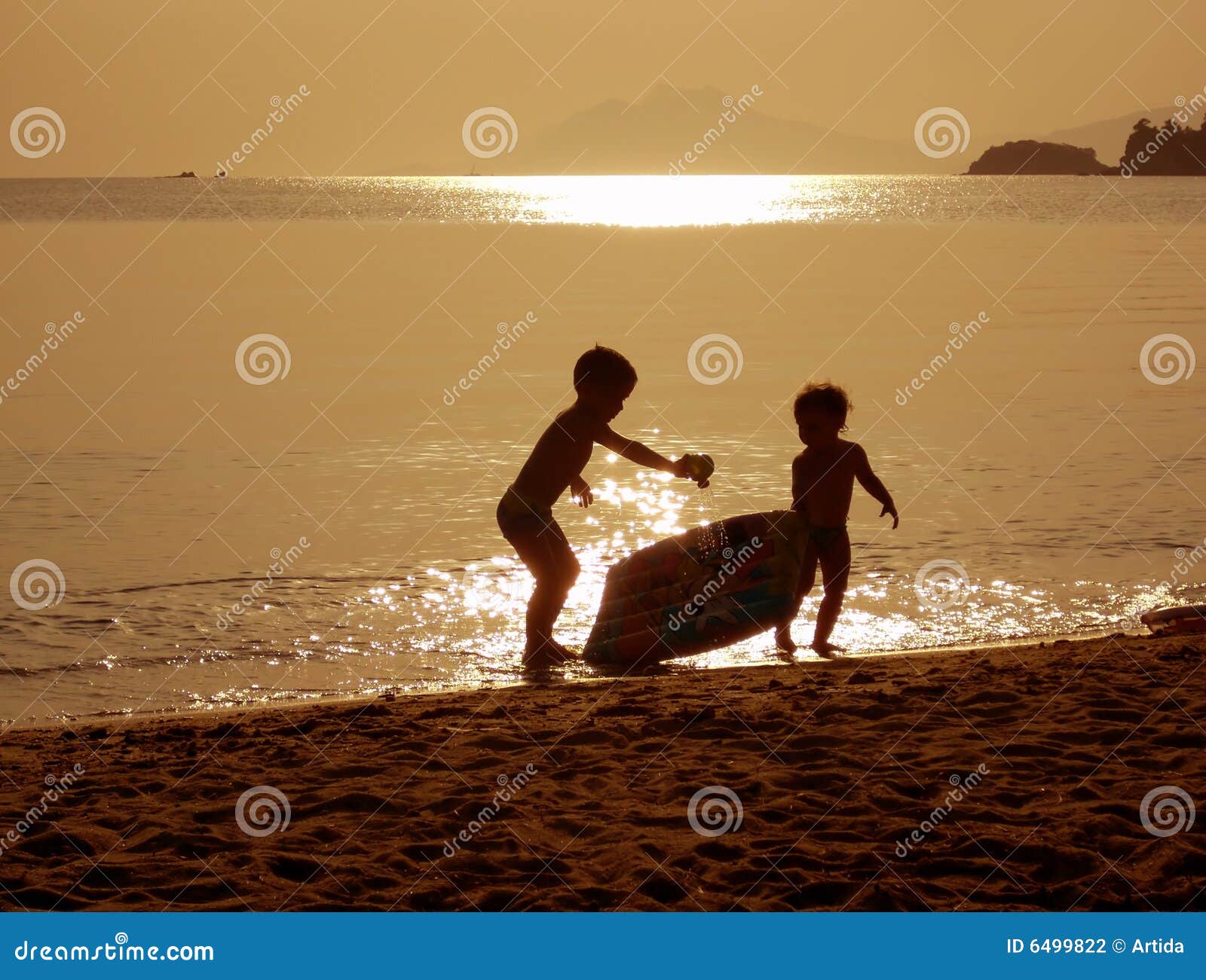 Children Playing on the Sunset Beach Stock Photo - Image of coast ...