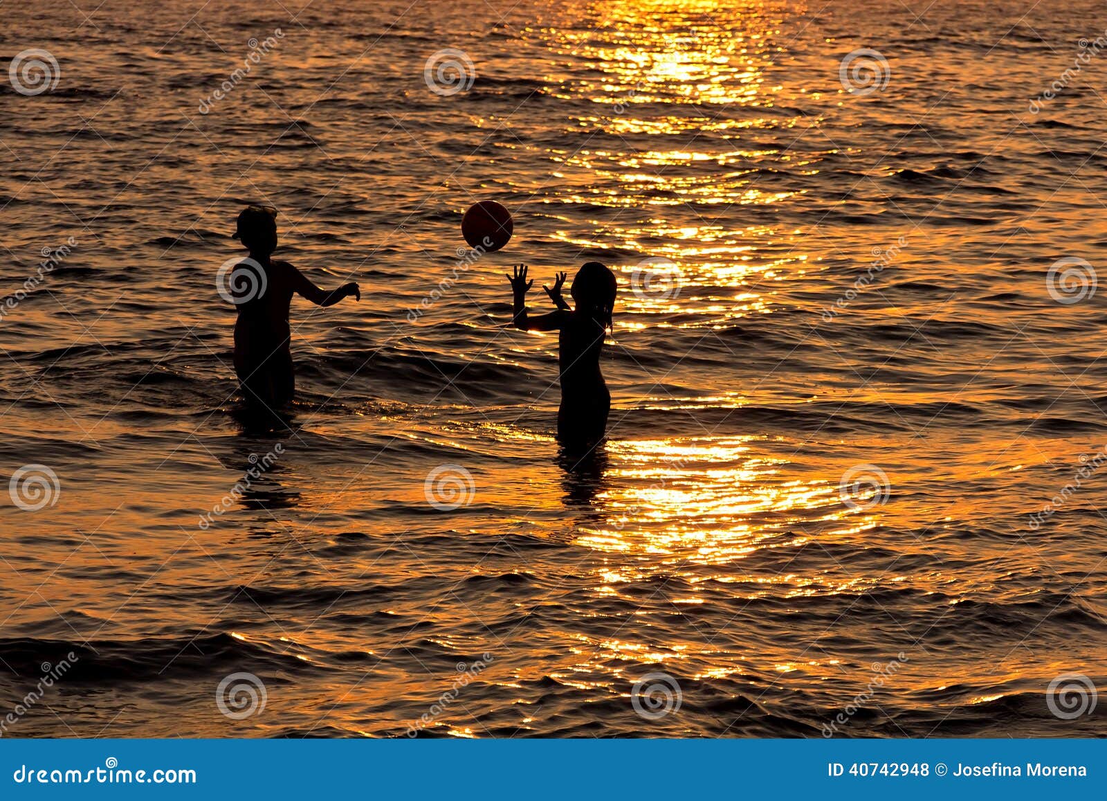 Children playing at sunset stock photo. Image of poetry - 40742948
