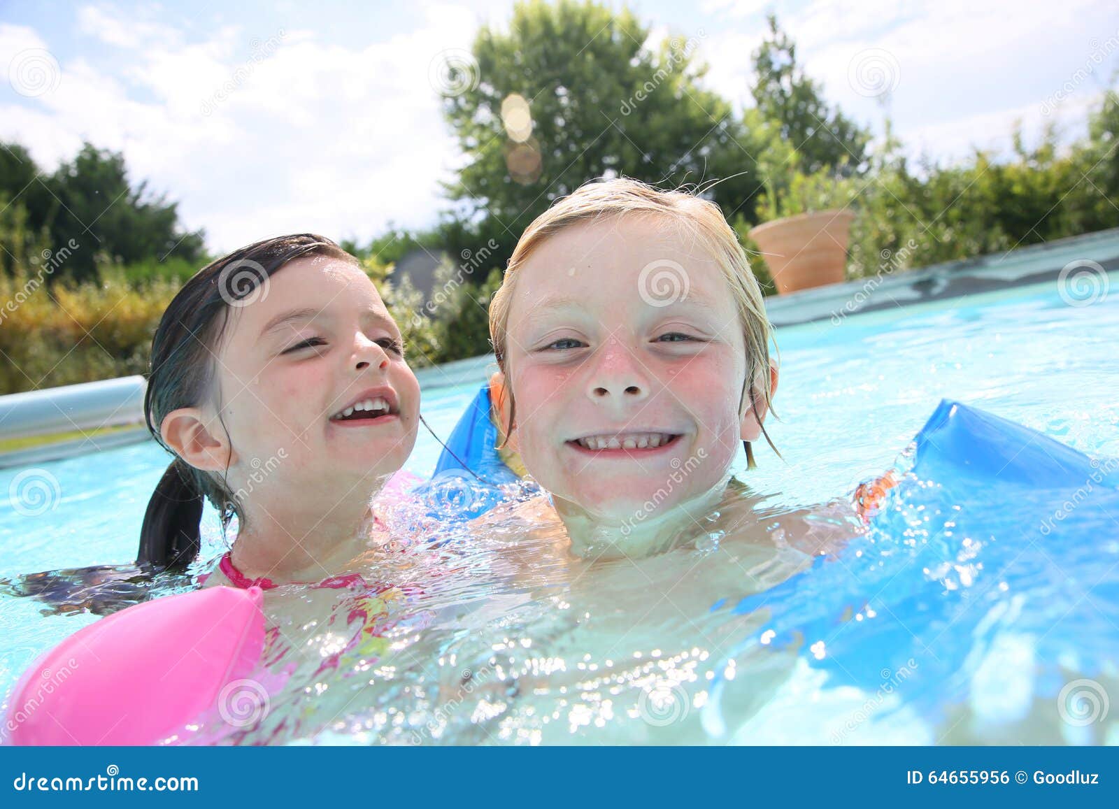 Children Playing in Swimming Pool Stock Photo - Image of smiling ...