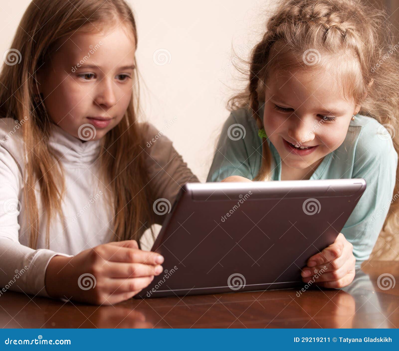 Children playing on tablet stock image. Image of learning - 29219211