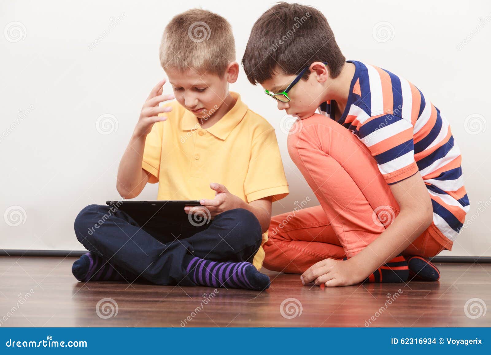 Children Playing on Tablet. Stock Photo - Image of wireless, happiness ...