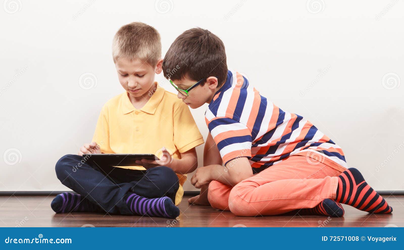 Children Playing on Tablet. Stock Photo - Image of tablet, technology ...