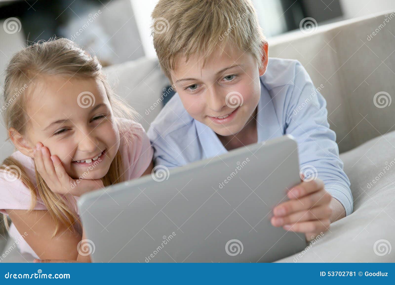 Children playing on tablet stock image. Image of playing - 53702781