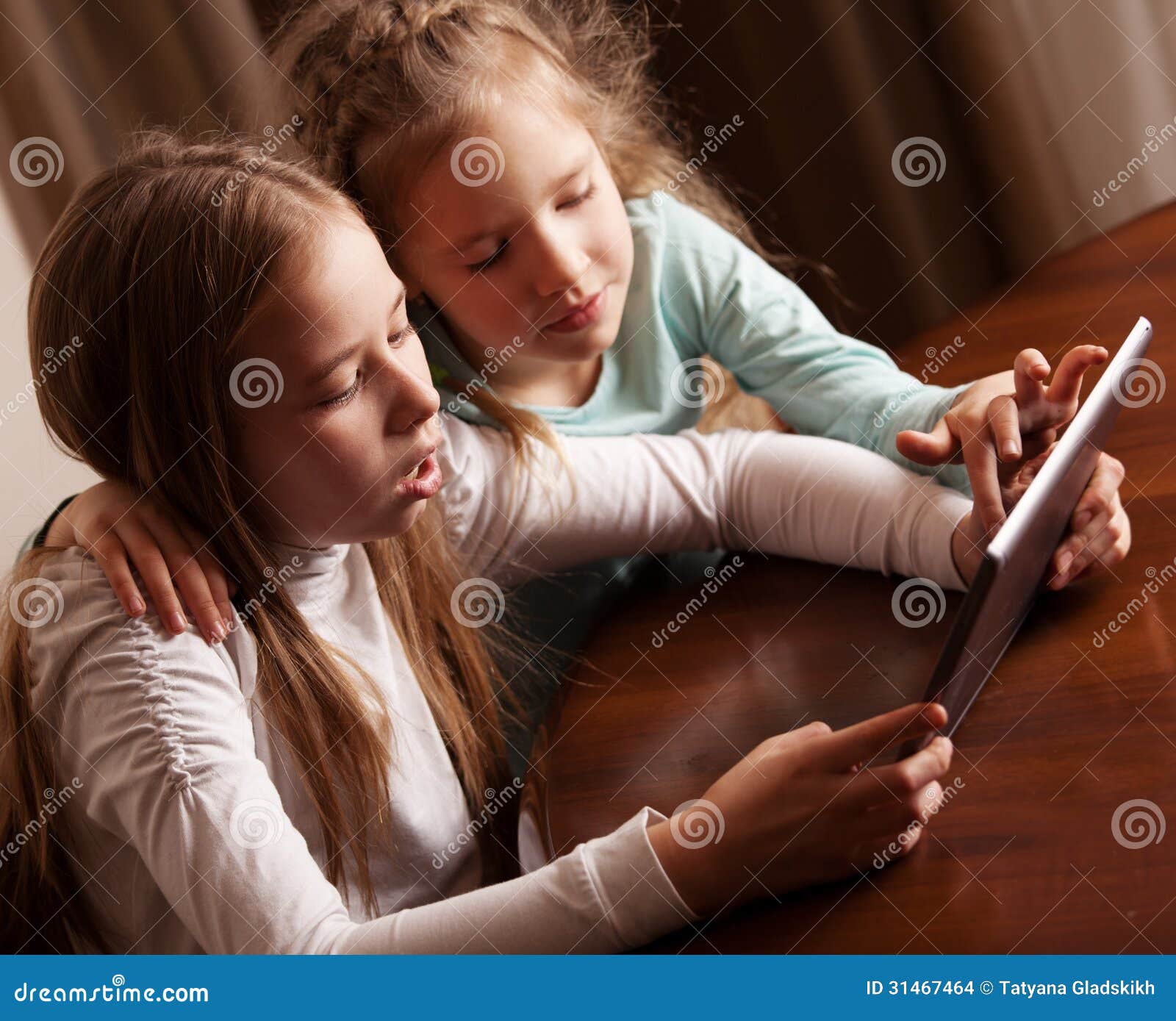 Children playing on tablet stock photo. Image of reading - 31467464