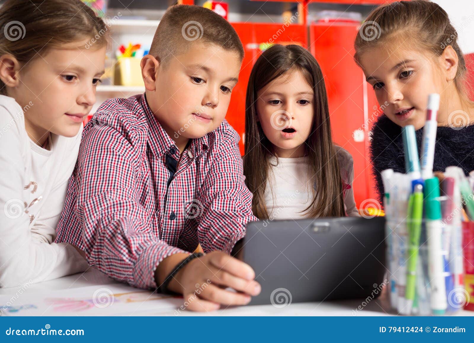 Children Playing on Tablet. Stock Photo - Image of concentration ...
