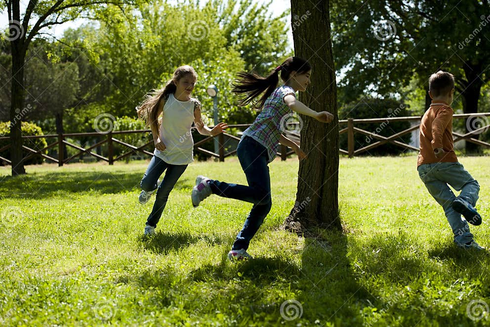 Children playing tag stock image. Image of action, small - 25927067