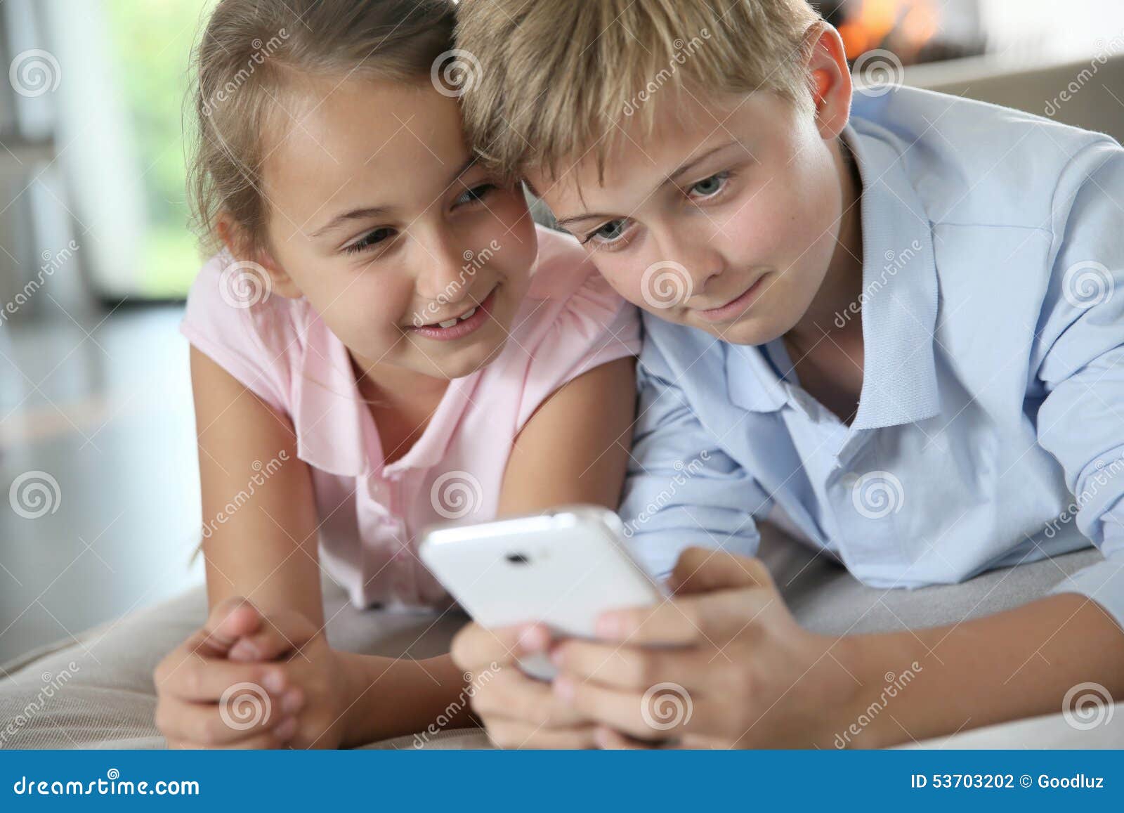 Children Playing Together on Smartphone Stock Photo - Image of ...