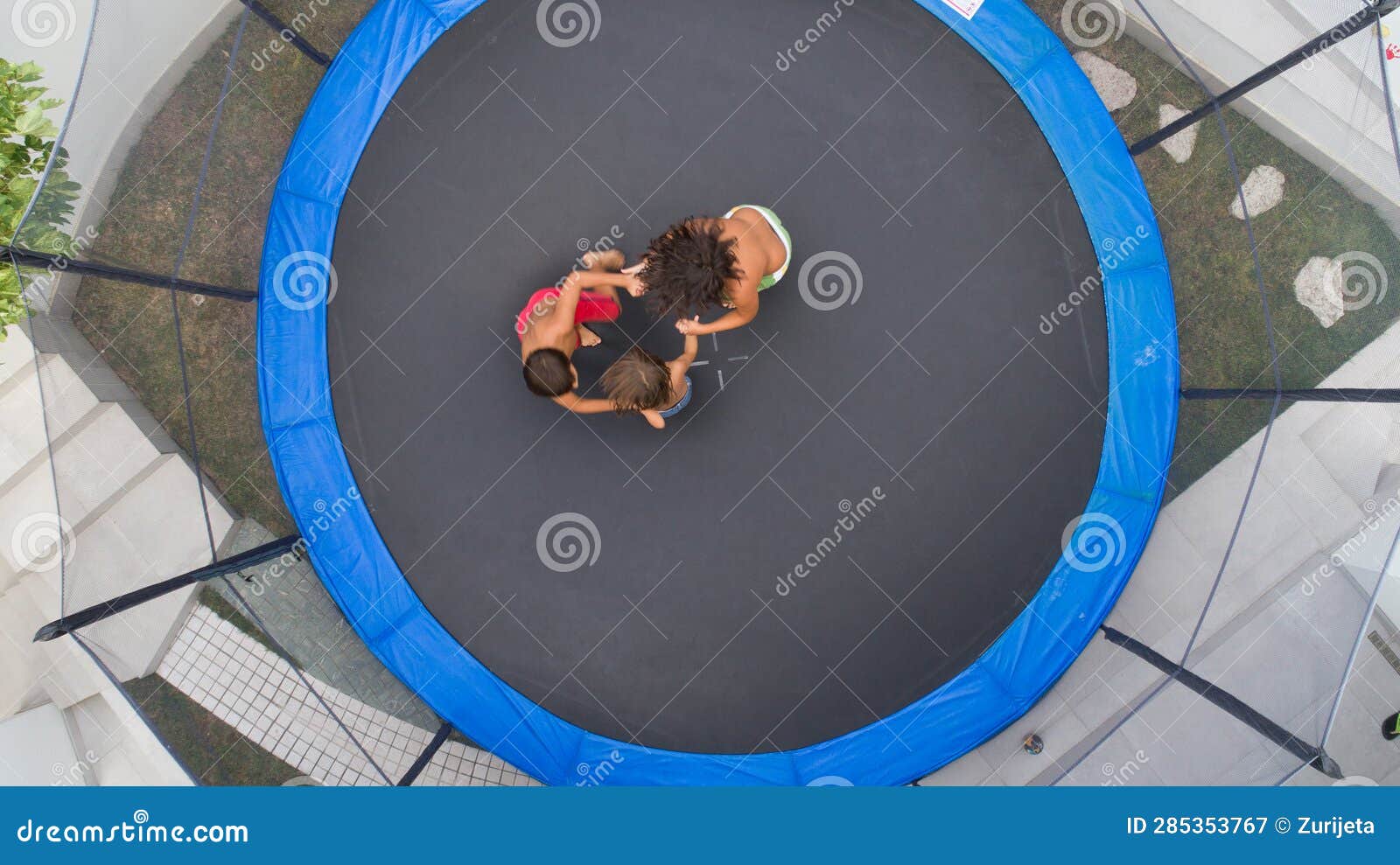Children Playing on Trampoline Aerial View Stock Image - Image of ...