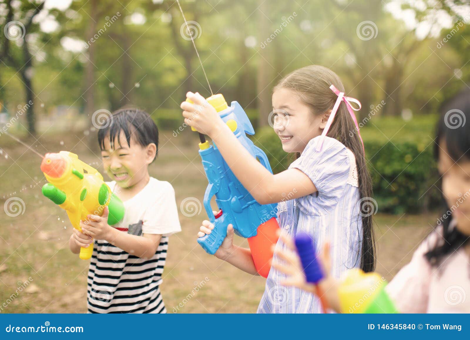 Children Playing with Water Guns on Summer Stock Photo - Image of park ...