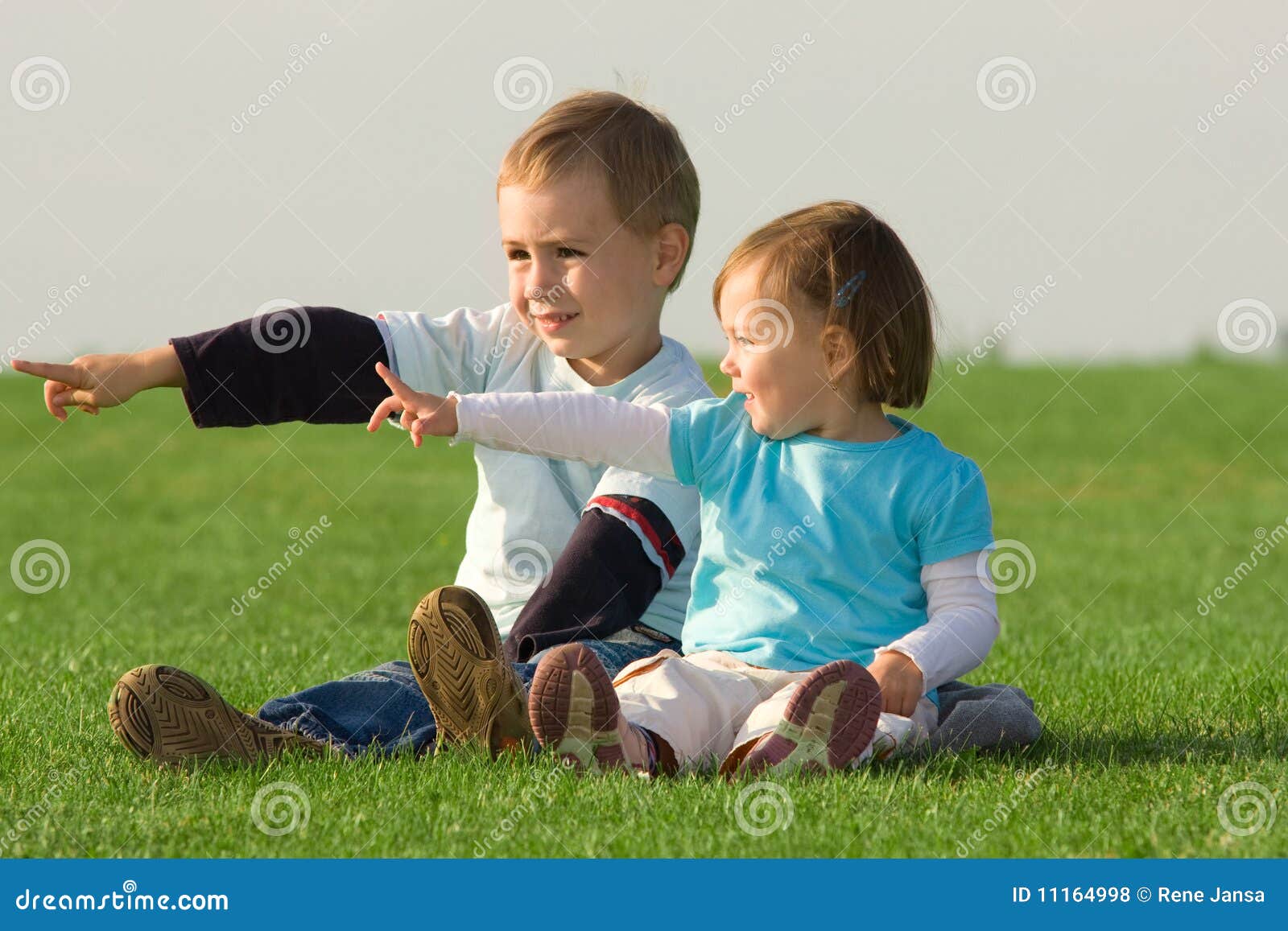Children pointing outdoors stock photo. Image of people - 11164998