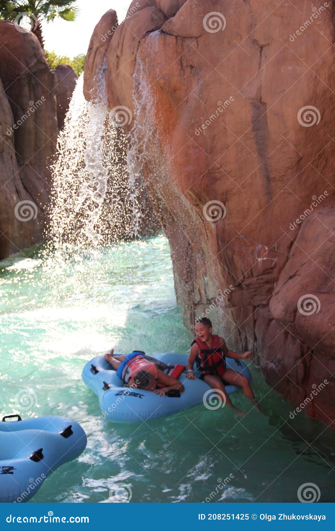Children in the Pool with a Waterfall and Decorative Mountains. Turkey ...