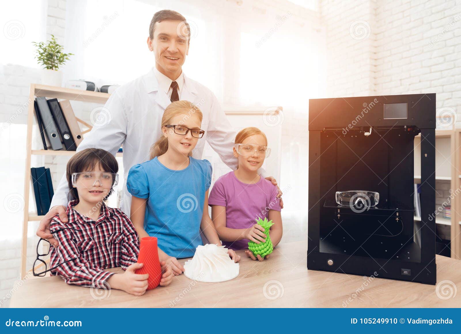 Children Posing on the Camera Together with the Teacher and 3d Printer ...