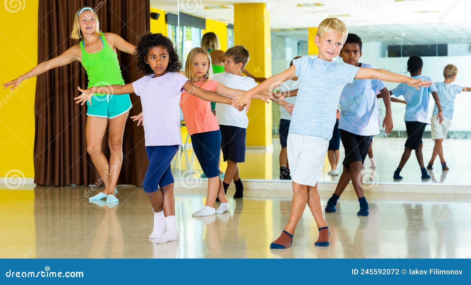Children Practicing Jive Movements Stock Photo - Image of kids ...