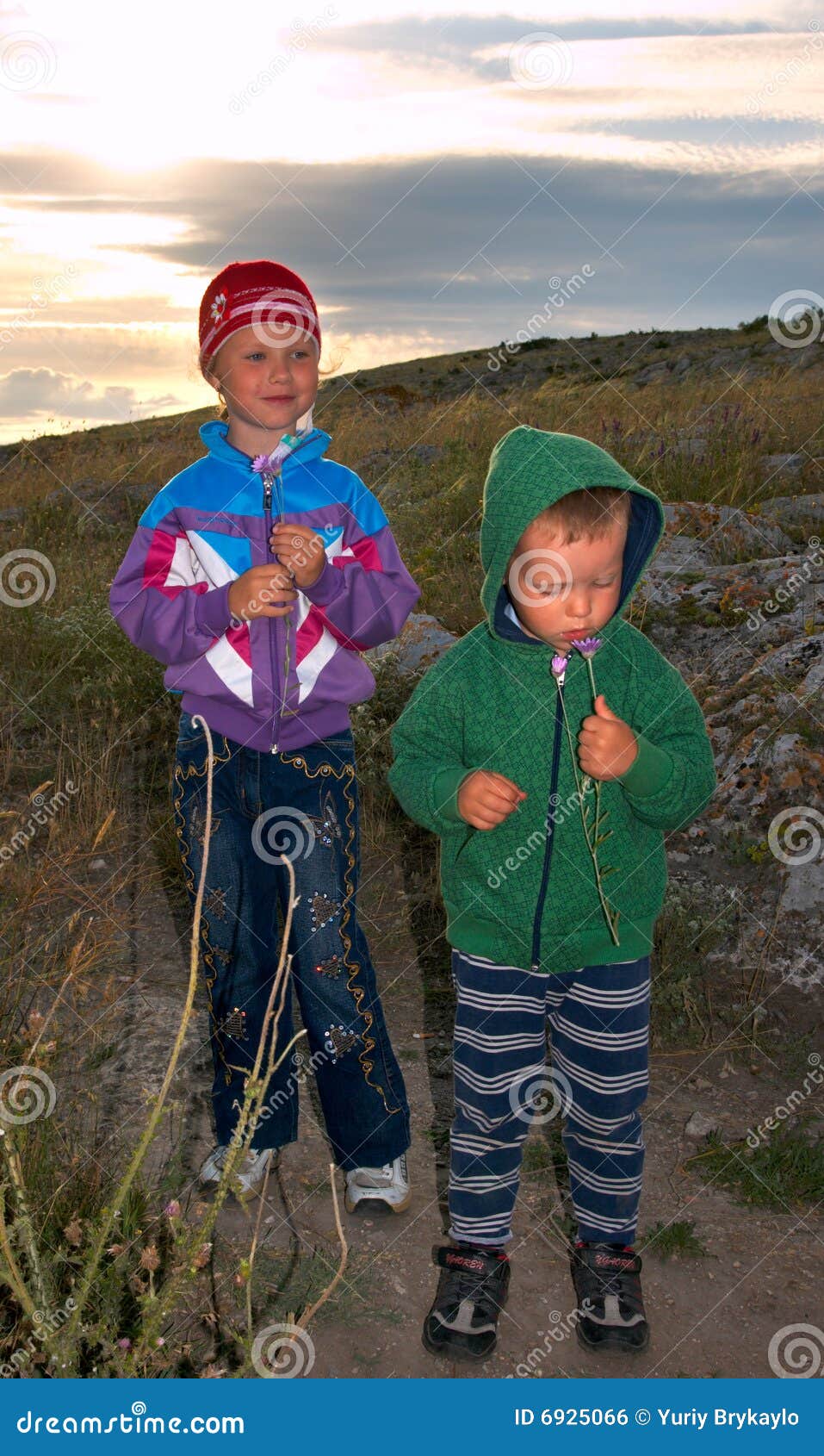 Children in prairie stock photo. Image of evening, examine - 6925066
