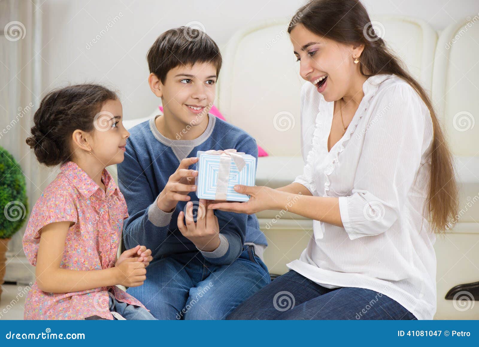 Children Presenting a Gift To Mother Stock Image - Image of brother ...