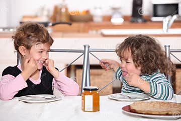Children pulling faces stock photo. Image of dining, breakfast - 35905900