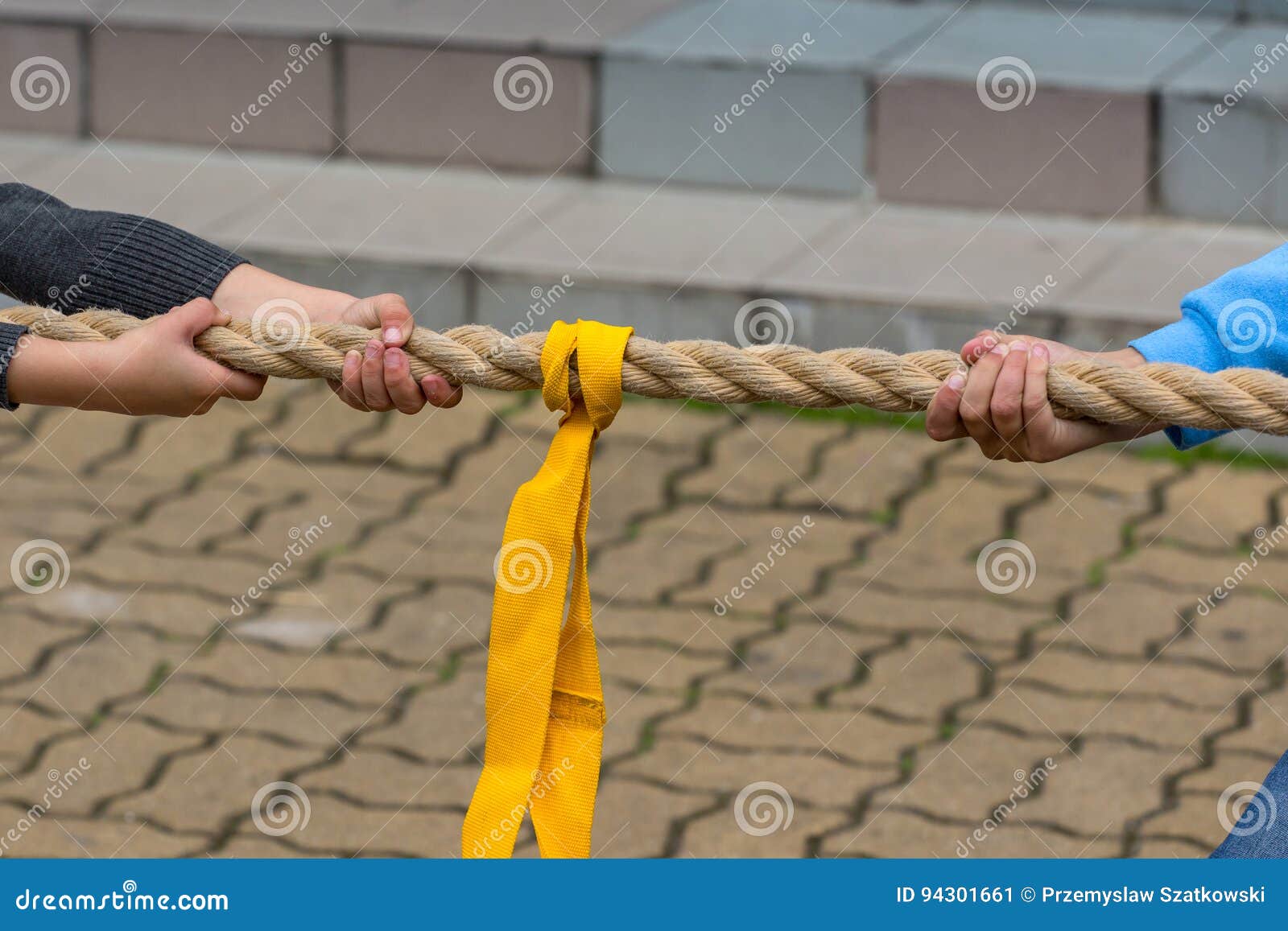 Children pulling rope stock image. Image of cooperation - 94301661