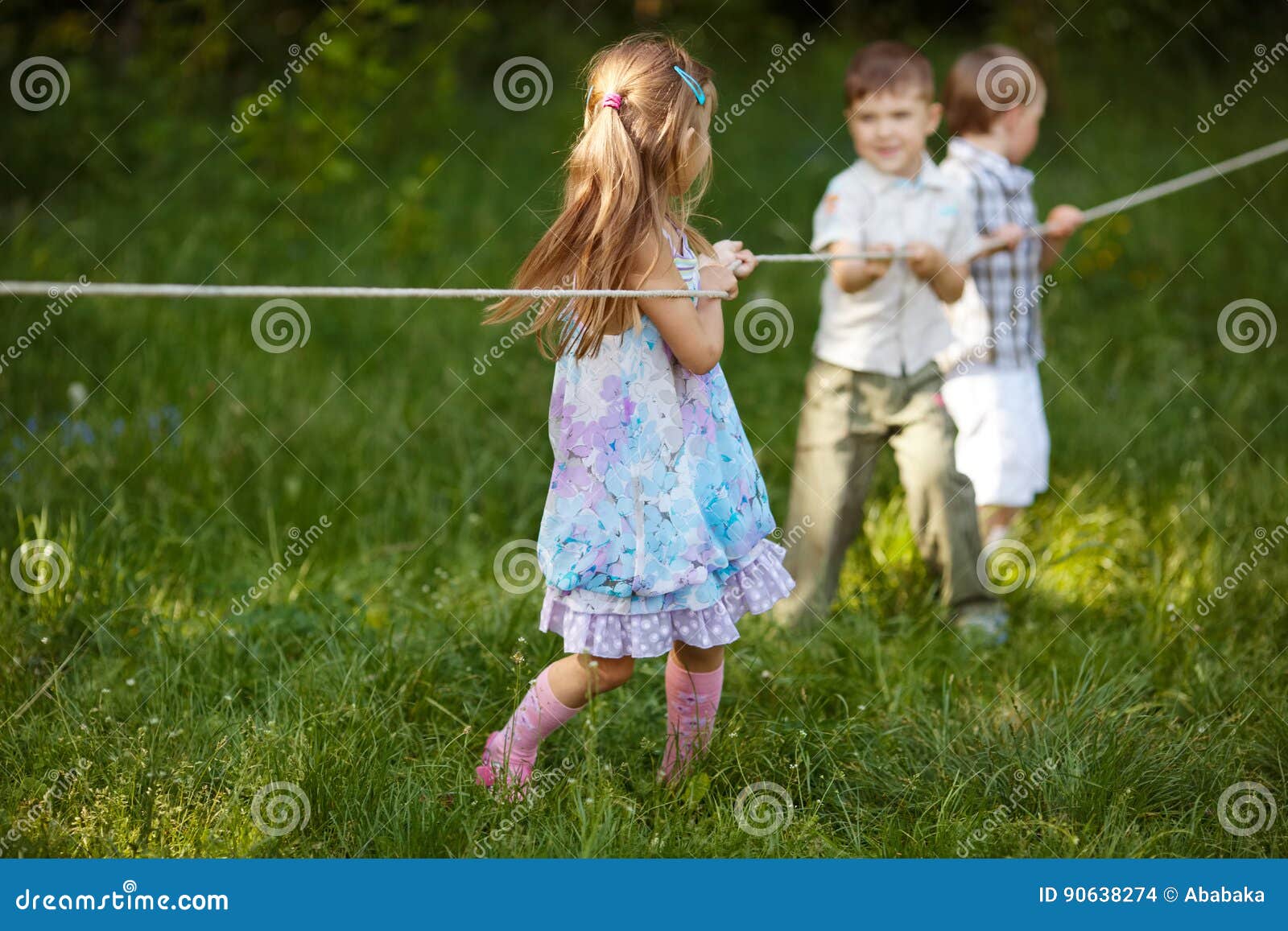 Children Pulling the Rope Outdoors Stock Photo - Image of camp, game ...