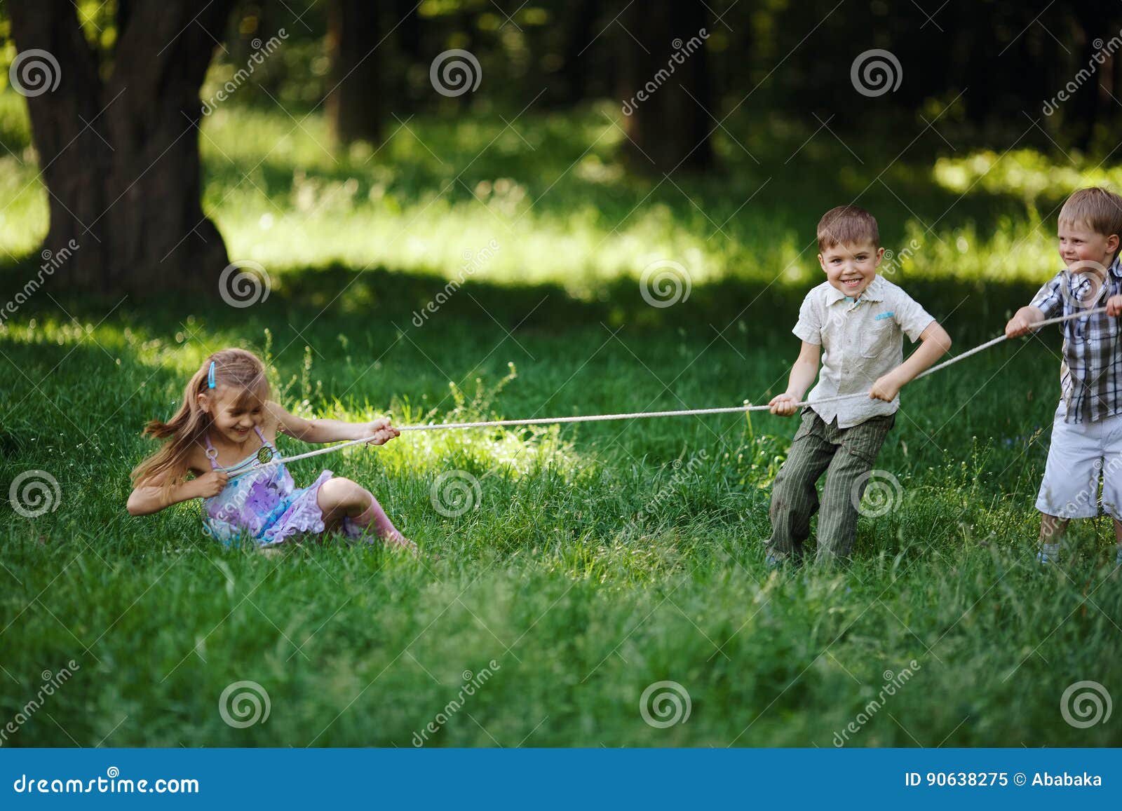 Children Pulling the Rope Outdoors Stock Image - Image of black ...