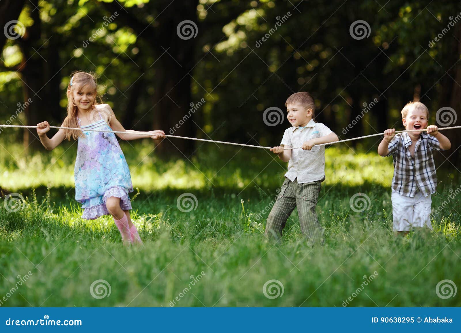 Children Pulling the Rope Outdoors Stock Image - Image of activity ...