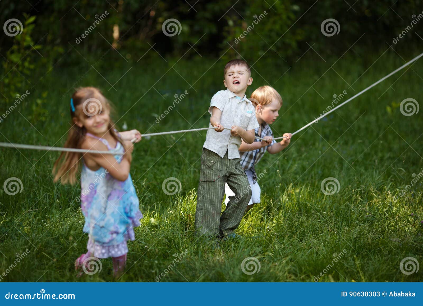 Children Pulling the Rope Outdoors Stock Image - Image of happy, girl ...