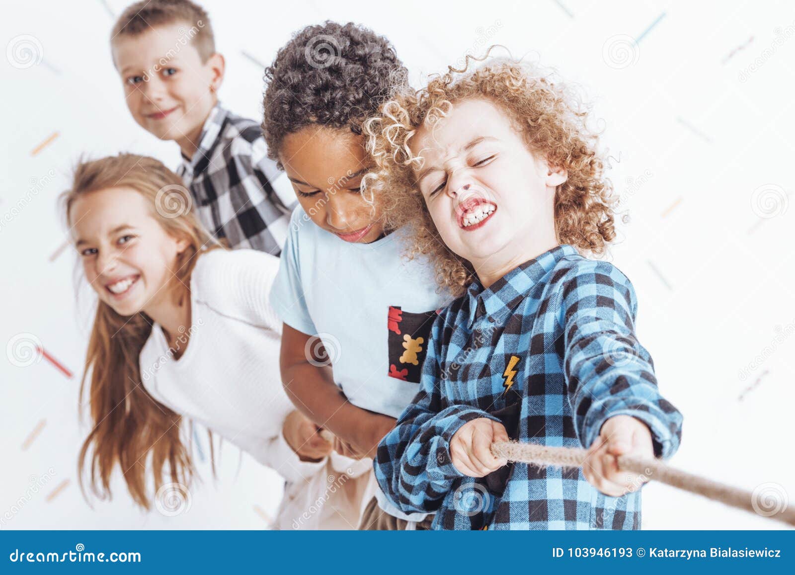 Children pulling the rope stock image. Image of blurred - 103946193