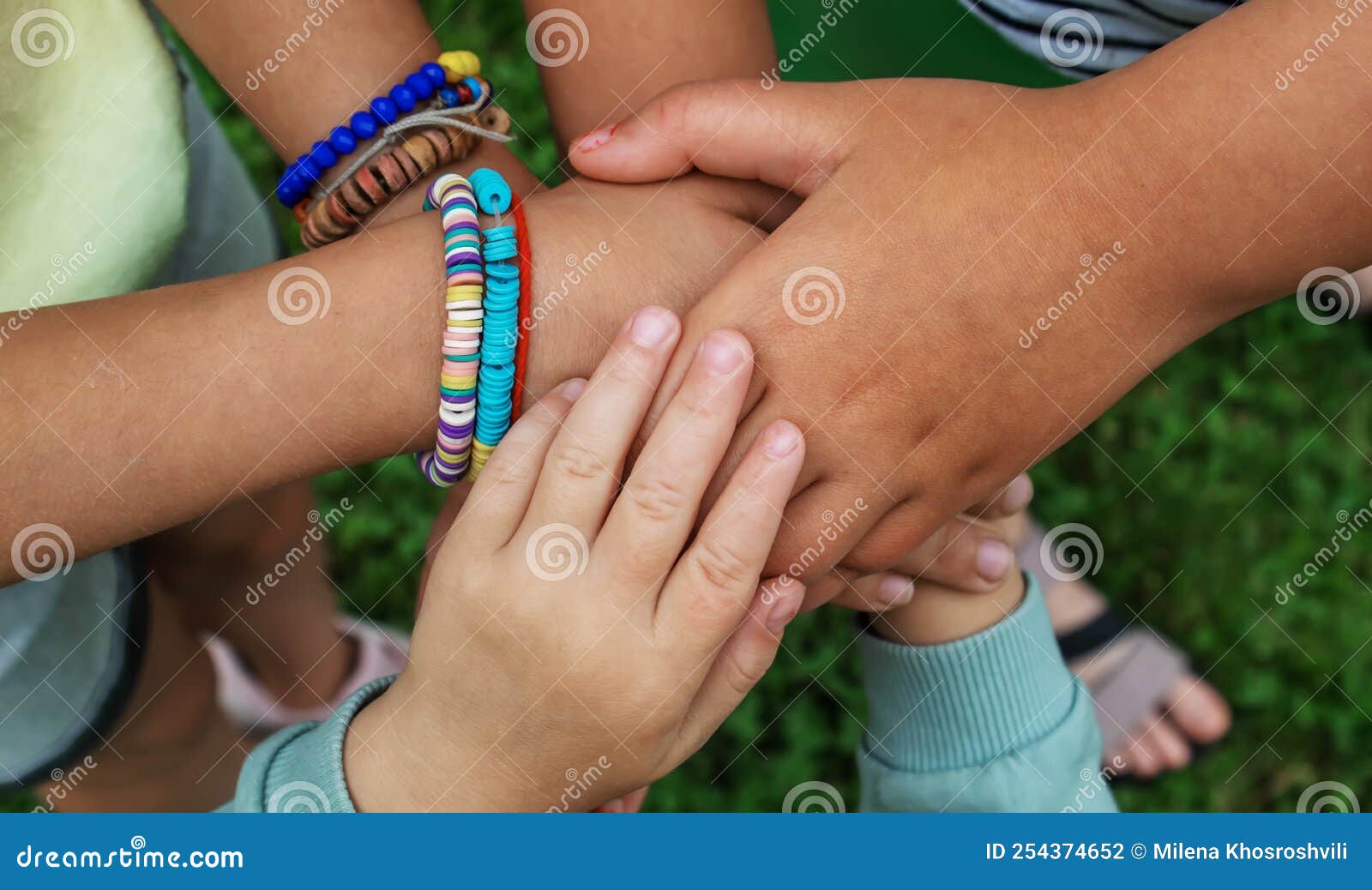 The Children Put Their Hands Together. Selective Focus Stock Photo ...