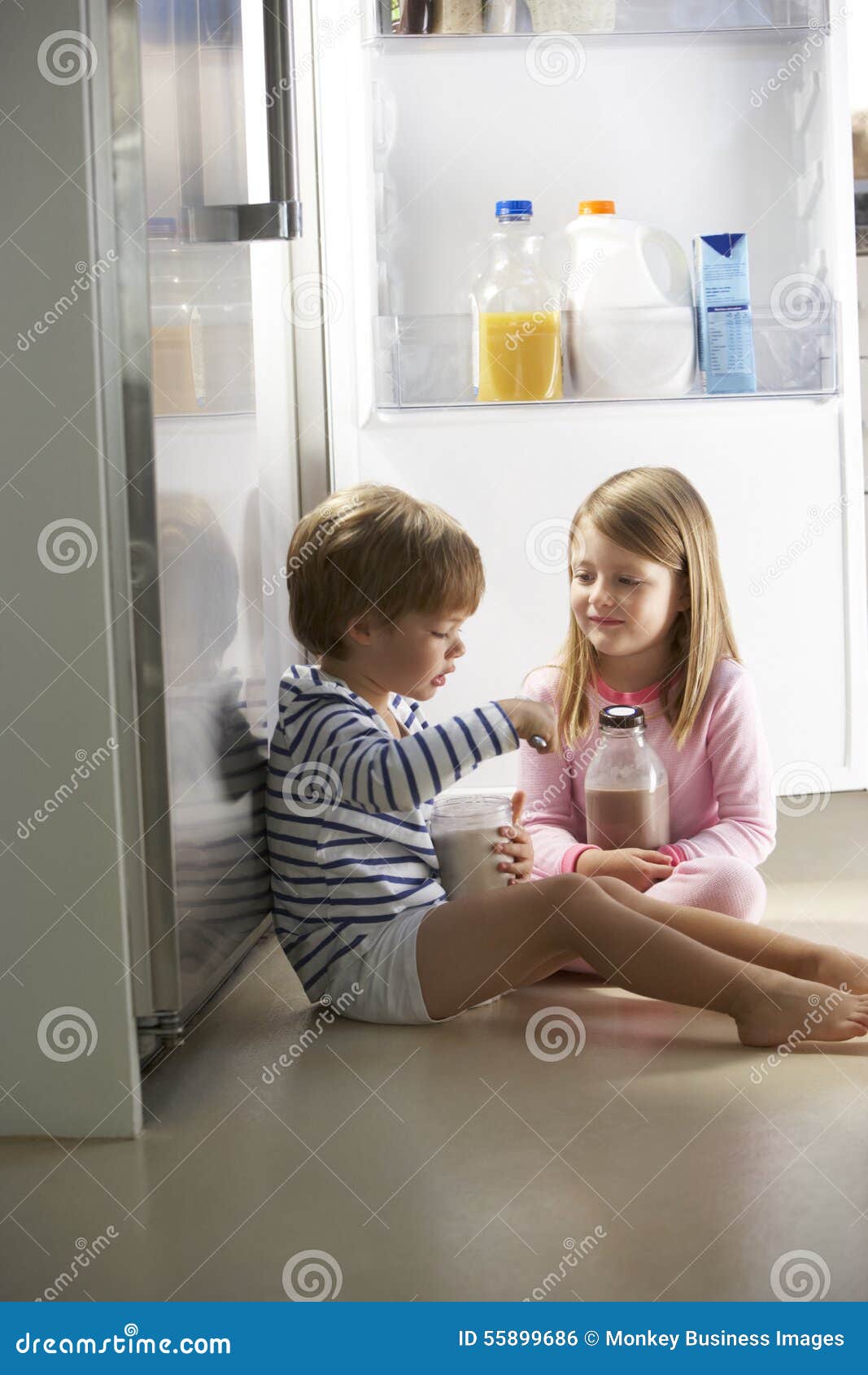 Children Raiding the Fridge Stock Photo - Image of brother, kitchen ...