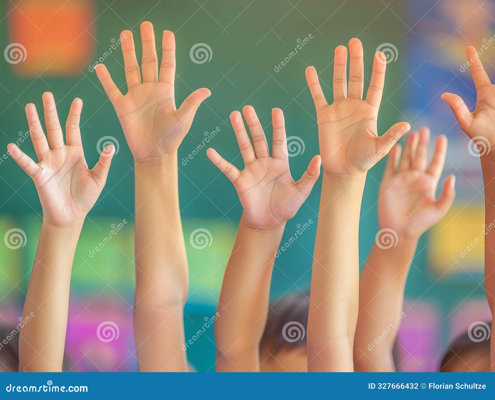 Children Raise Their Hands To Answer in the Classroom Stock ...