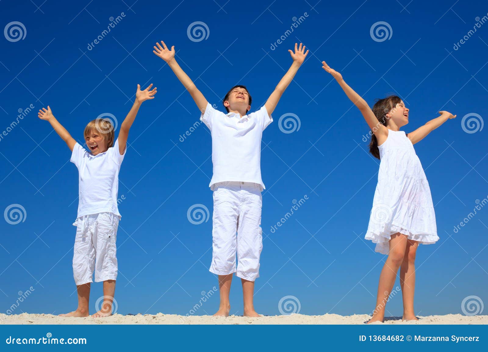 Children with raised hands stock photo. Image of female - 13684682